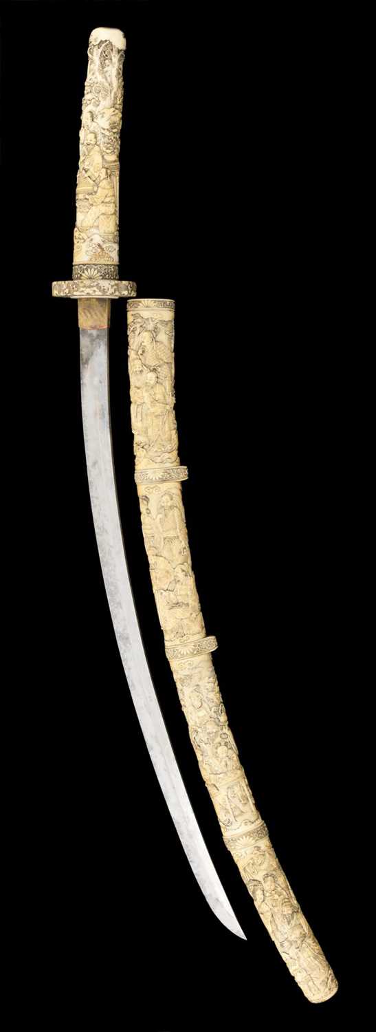 Lot 51 - ËœA JAPANESE IVORY SWORD (TACHI)