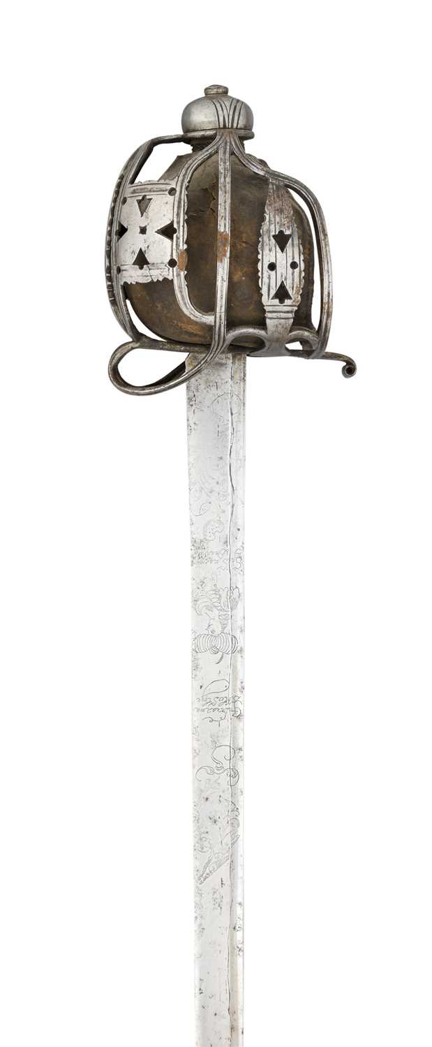 Lot 140 - A BASKET-HILTED BACKSWORD