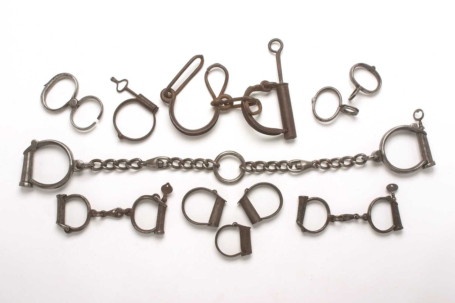 Lot 59 - NINE VARIOUS HANDCUFFS