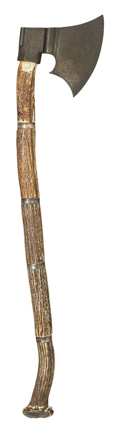 Lot 192 - A GERMAN DECORATED AXE