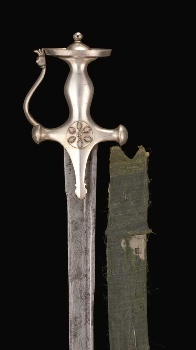 Lot 20 - AN INDIAN TALWAR WITH SILVERED HILT