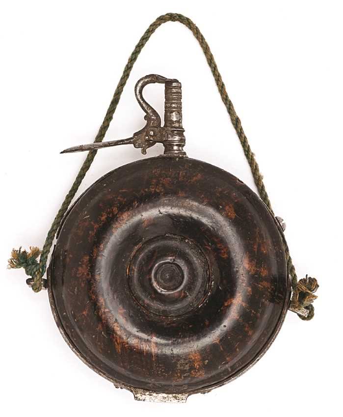 Lot 304 - A GERMAN CIRCULAR POWDER-FLASK