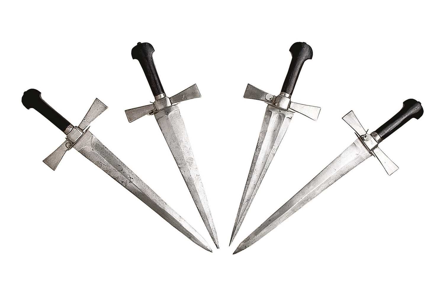 Lot 270 - FOUR UNUSUAL BROAD BLADED DAGGERS
