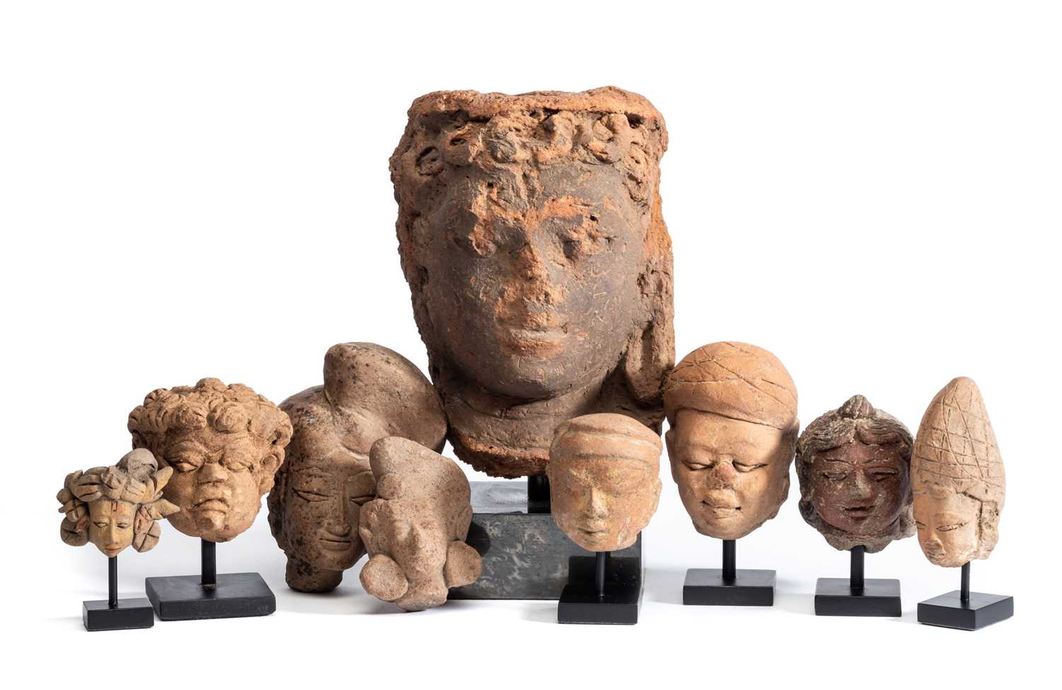 Lot 177 - NINE JAVANESE TERRACOTTA HEADS