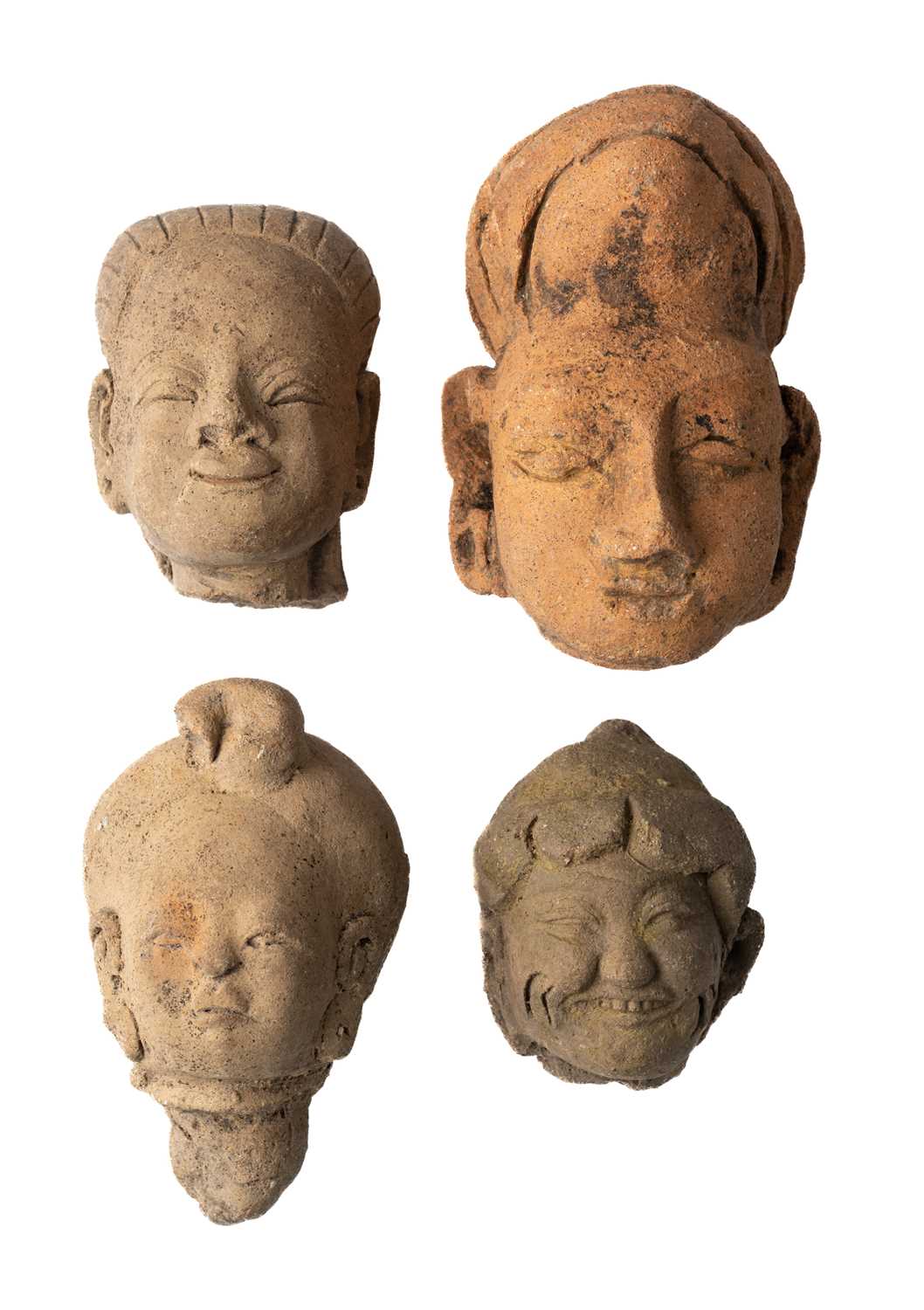 Lot 186 - FOUR SMALL MAJAPAHIT TERRACOTTA HEADS