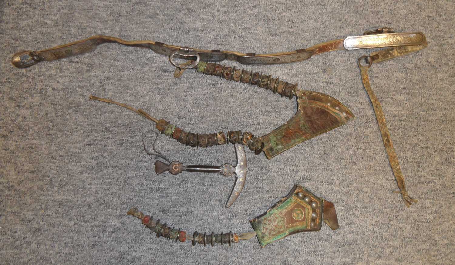 Lot 101 - â€¡ A CENTRAL ASIAN DECORATED BELT AND FLINT