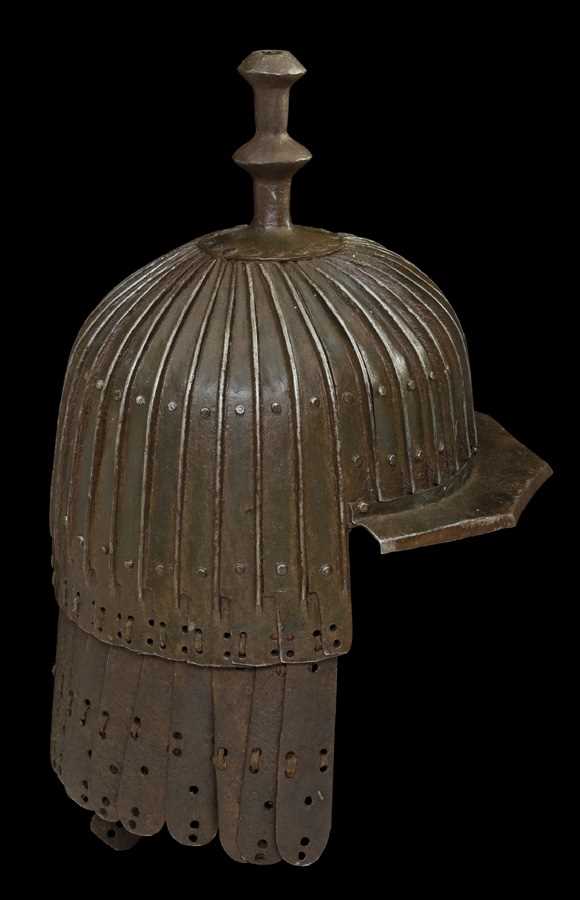 Lot 97 - A RARE EASTERN HELMET