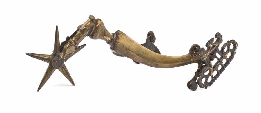 Lot 259 - A BRASS ROWEL SPUR