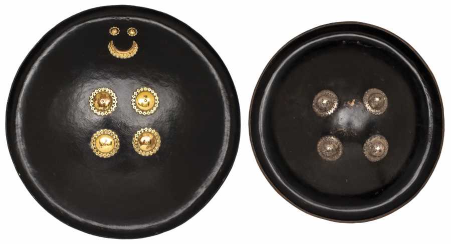 Lot 317 - TWO INDIAN LACQUERED HIDE DHALS
