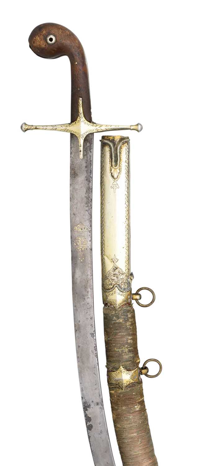 Lot 37 - **AN OTTOMAN SILVER-MOUNTED SWORD (SHAMSHIR)