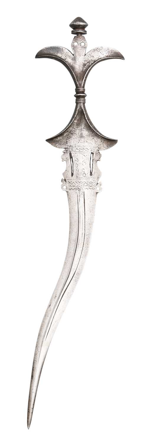 Lot 45 - **AN INDIAN DAGGER (CHILANUM) FORMED ENTIRELY