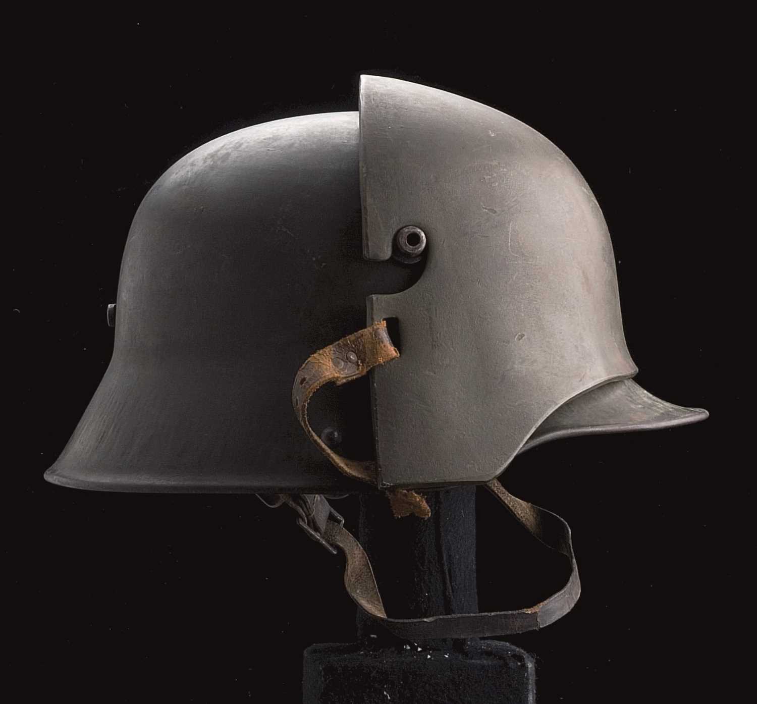 Lot 133 - A RARE GERMAN MODEL 1916 STEEL HELMET