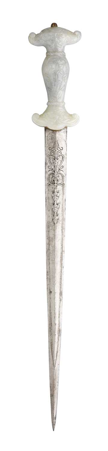 Lot 44 - AN INDIAN DAGGER WITH FINELY CARVED JADE HILT