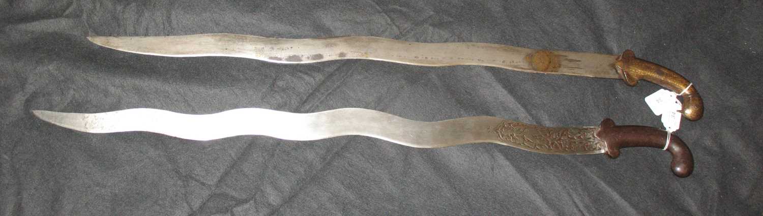 Lot 34 - TWO INDIAN SWORDS
