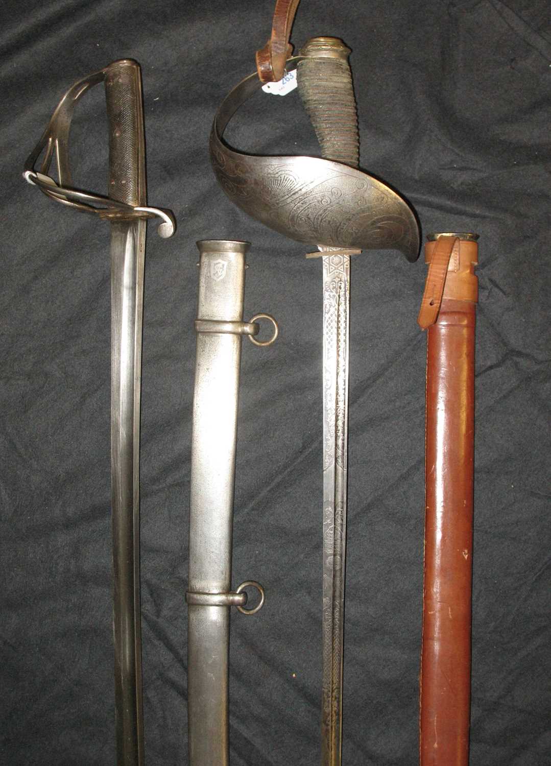 Lot 263 - A GEORGE V 1911 PATTERN CAVALRY SWORD AND A