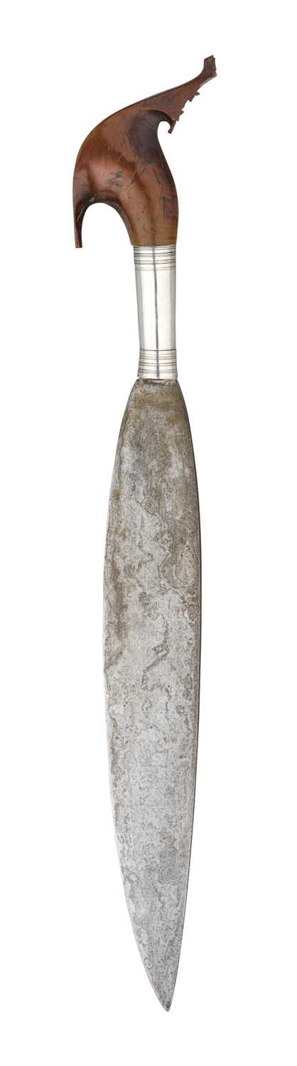 Lot 125 - SIX MALAYSIAN AND SOUTHEAST ASIAN DAGGERS