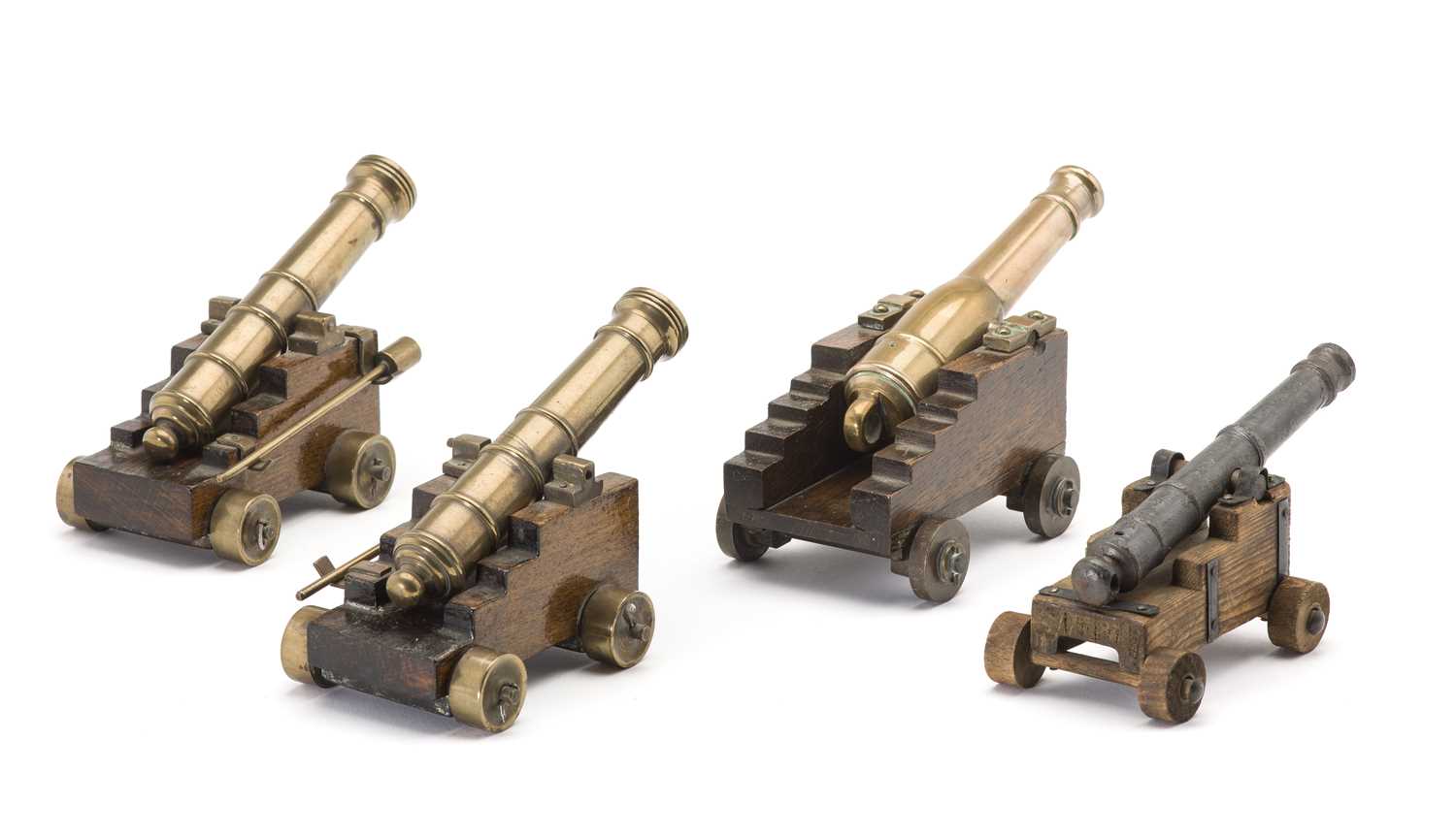 Lot 447 - A FOUR MINIATURE CANNON IN 18TH AND 19TH