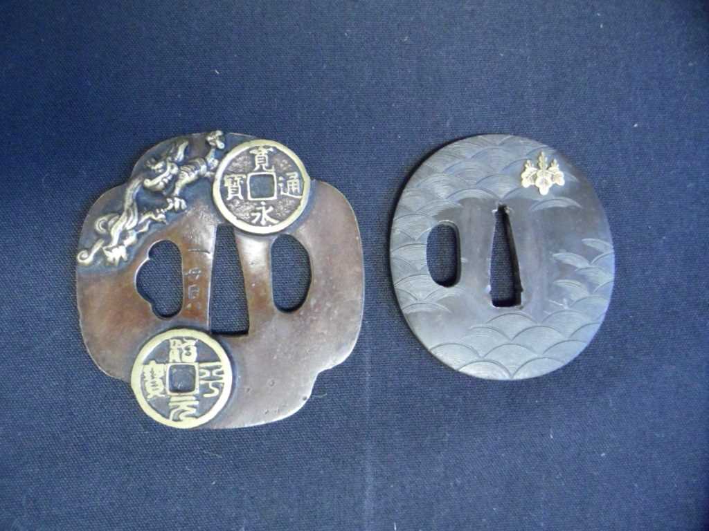 Lot 50 - TWO JAPANESE SWORD GUARDS (TSUBA)