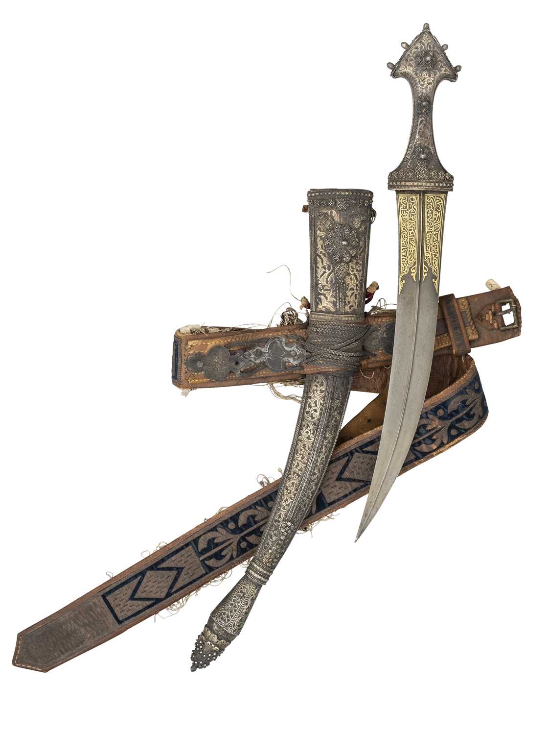 Lot 137 - AN ARAB SILVER-MOUNTED DAGGER (JAMBIYA),