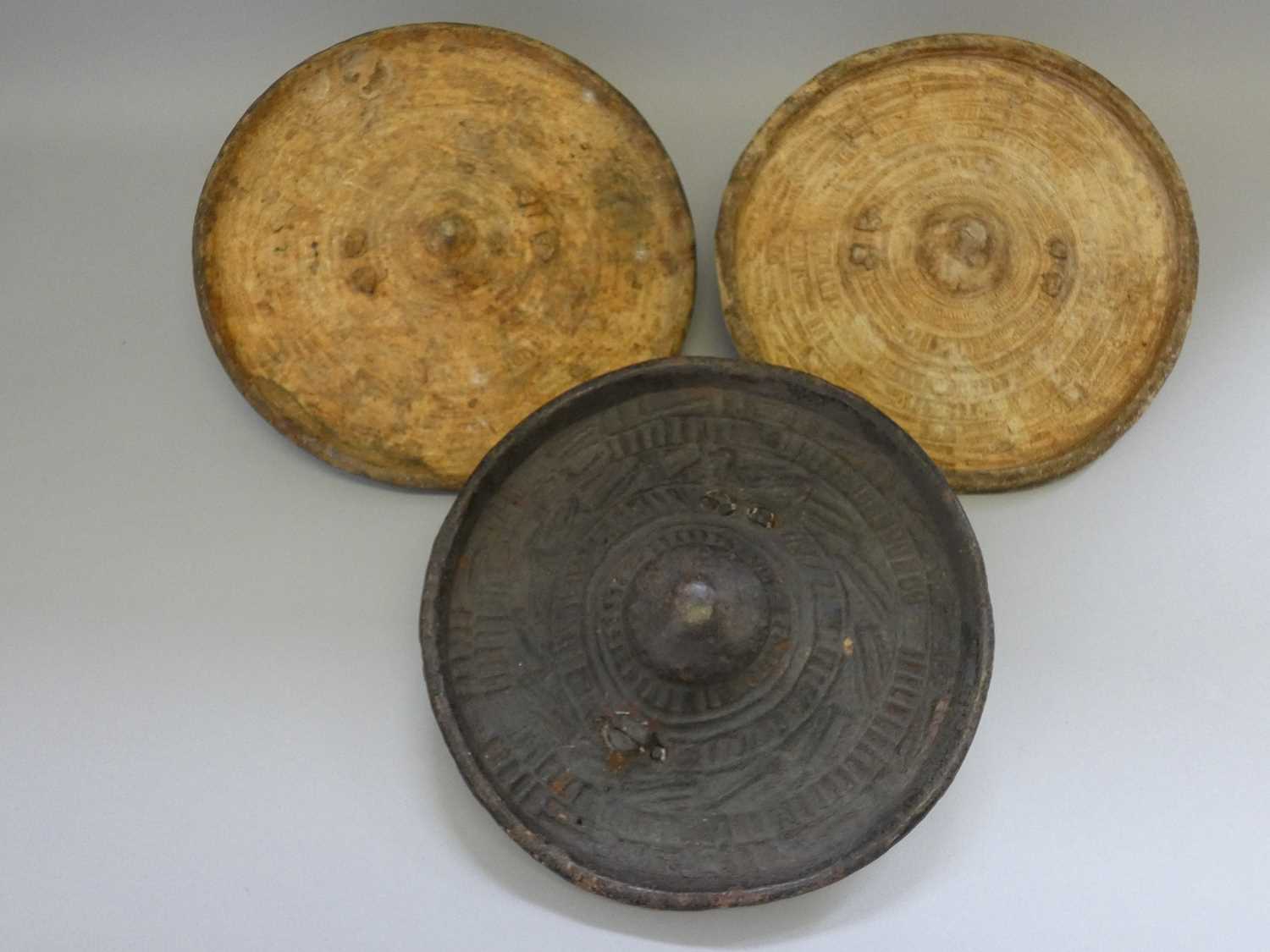 Lot 168 - THREE EAST AFRICAN HIDE CIRCULAR SHIELDS,