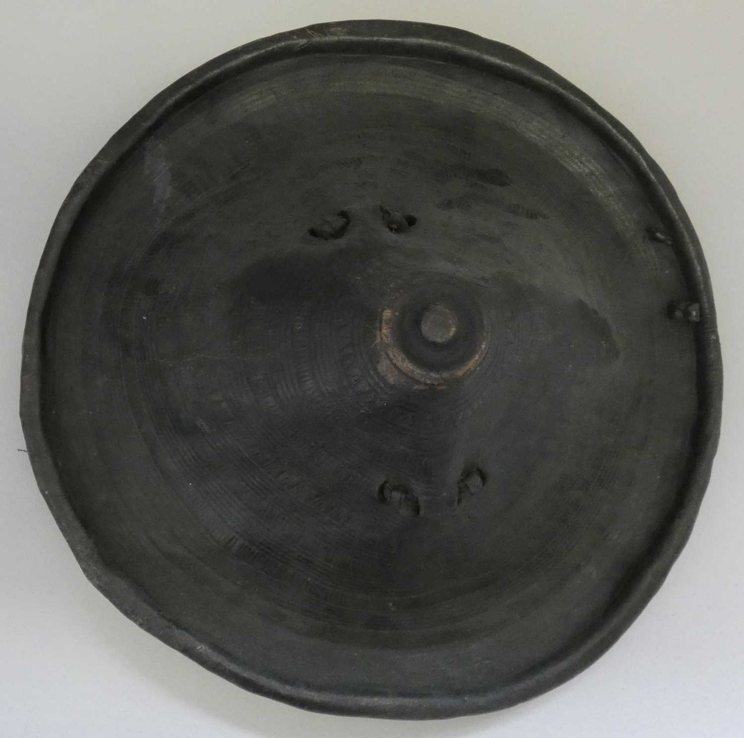 Lot 169 - A NORTH AFRICAN BLACKENED HIDE CIRCULAR