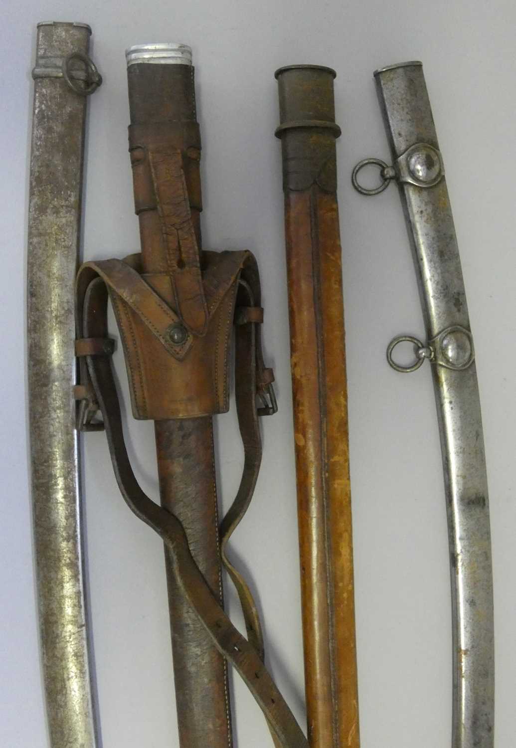 Lot 267 - A LARGE QUANTITY OF SWORD SCABBARDS AND
