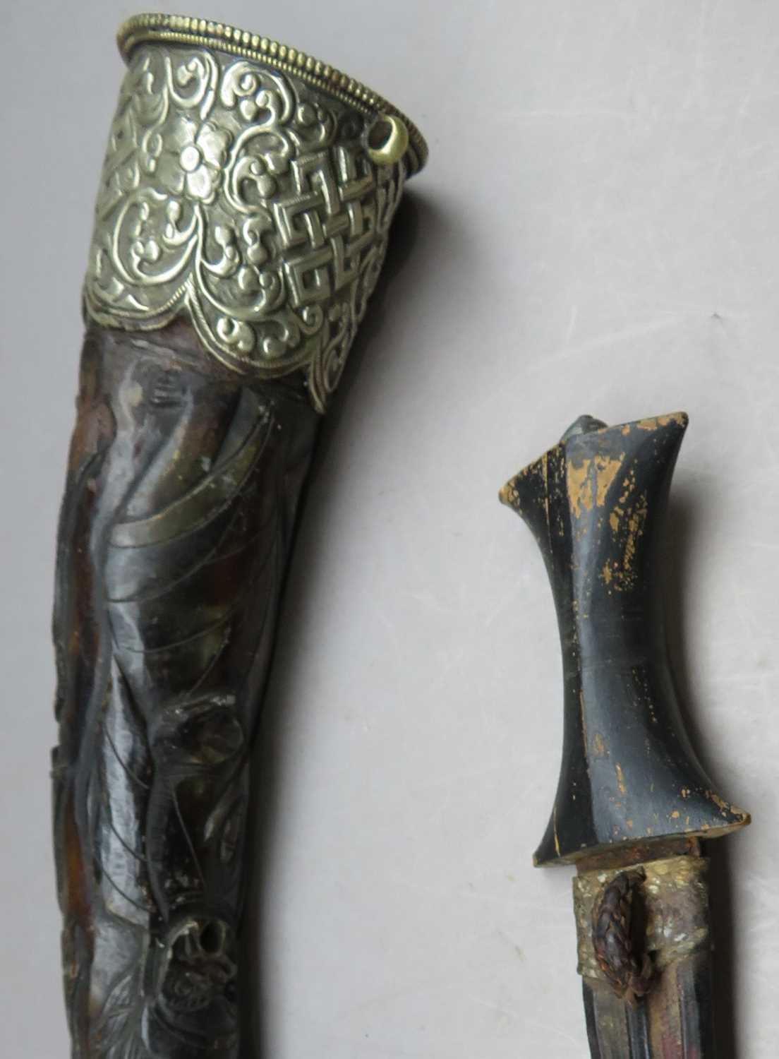 Lot 256 - â€¡A NORTH AFRICAN DAGGER AND A