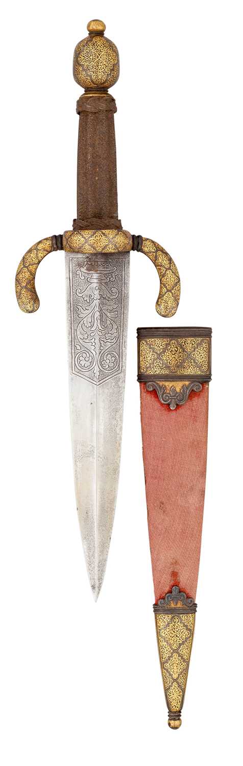 Lot 299 - â“Œ A SPANISH DECORATED LEFT-HAND DAGGER IN