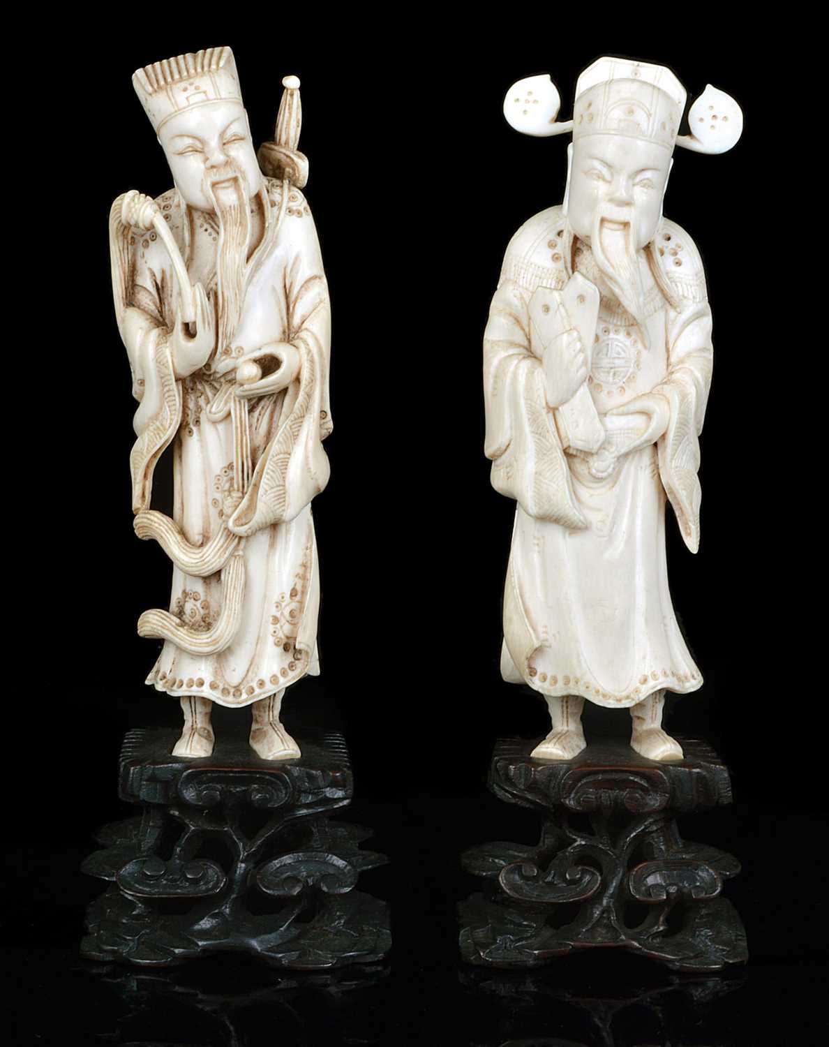 Lot 190 - TWO CHINESE IVORY FIGURES OF PRIESTS