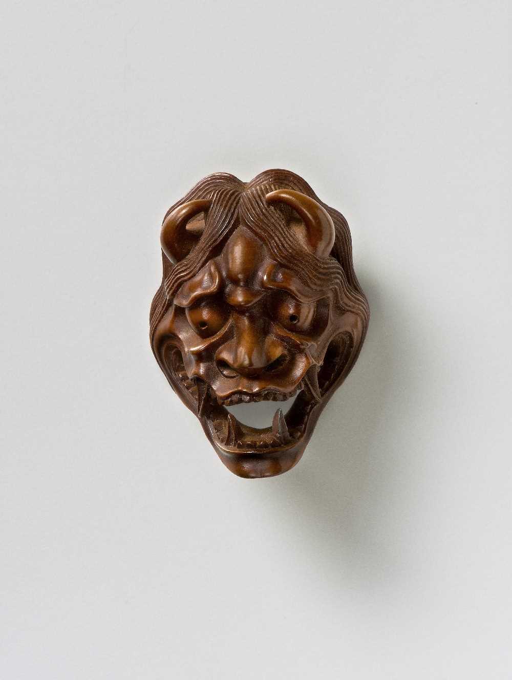 Lot 83 - A JAPANESE MASK NETSUKE OF SHINJA