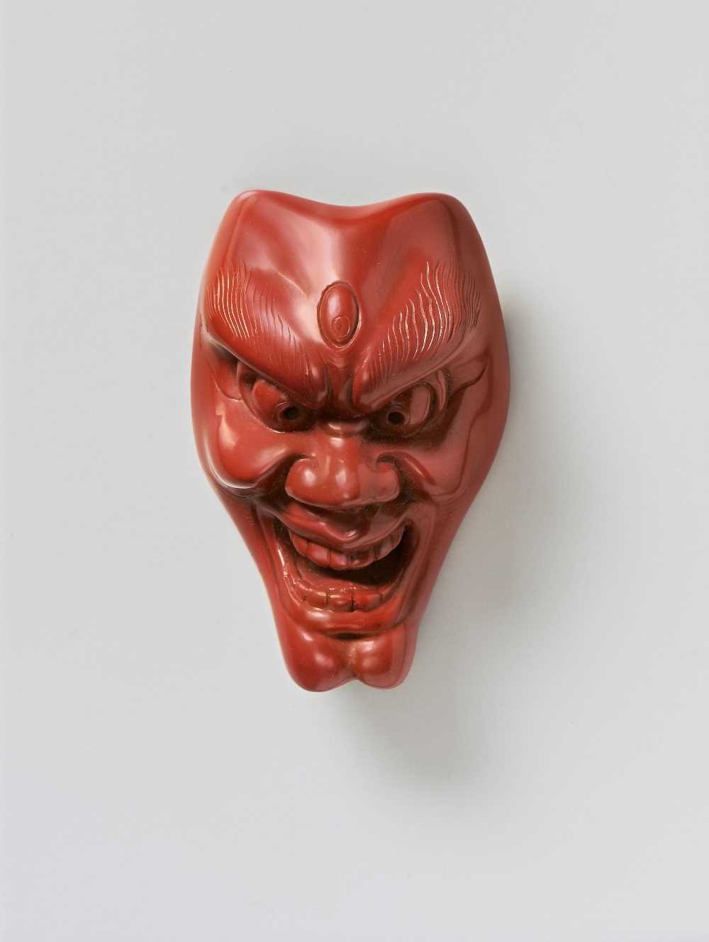 Lot 93 - A JAPANESE MASK NETSUKE OF SHISHIGUCHI