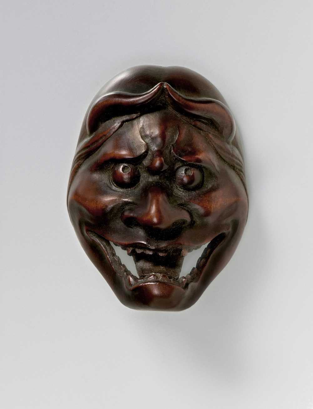 Lot 94 - A JAPANESE MASK NETSUKE OF SHINJA