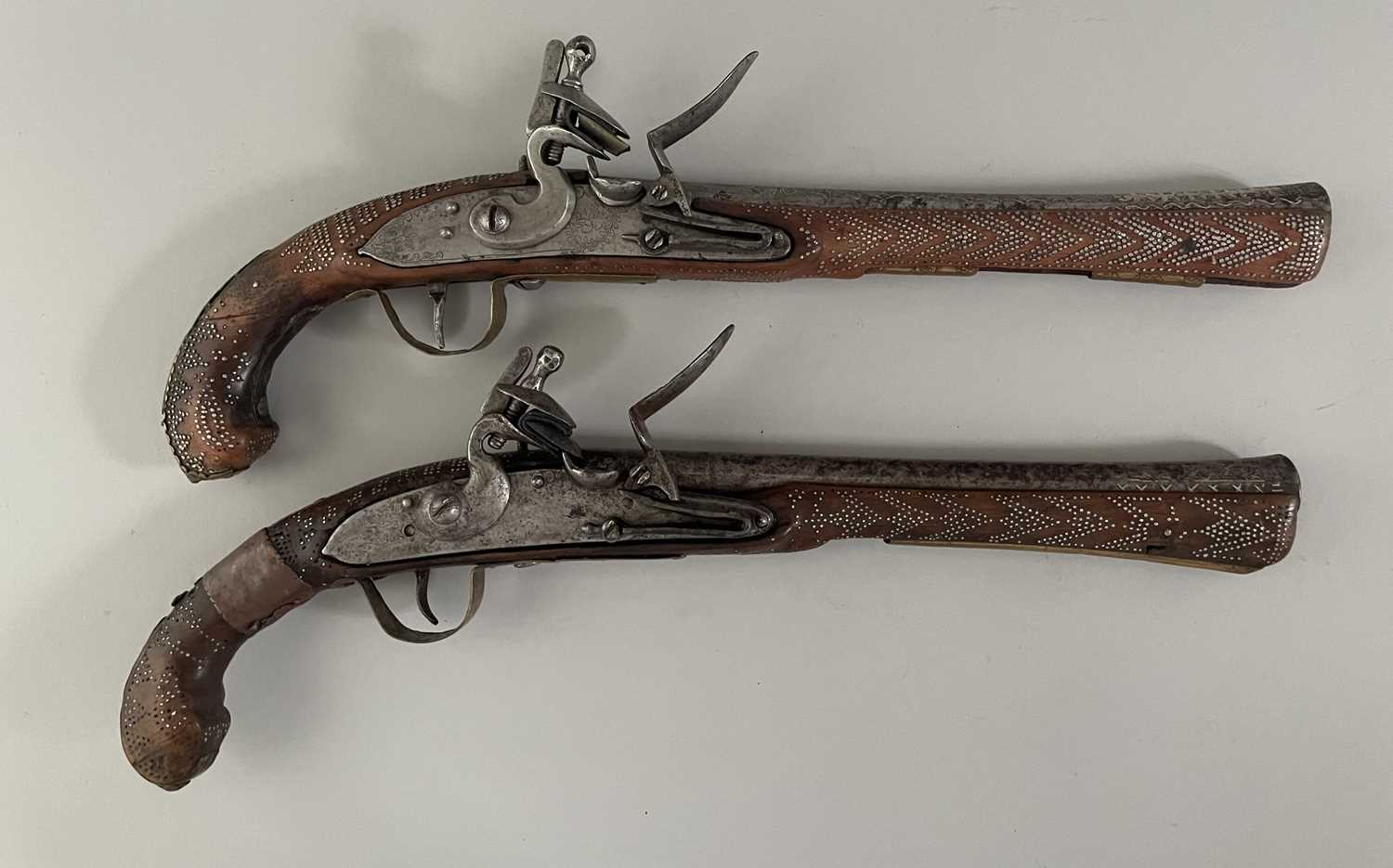 Lot 194 - TWO INDIAN FLINTLOCK BLUNDERBUSS PISTOLS FOR