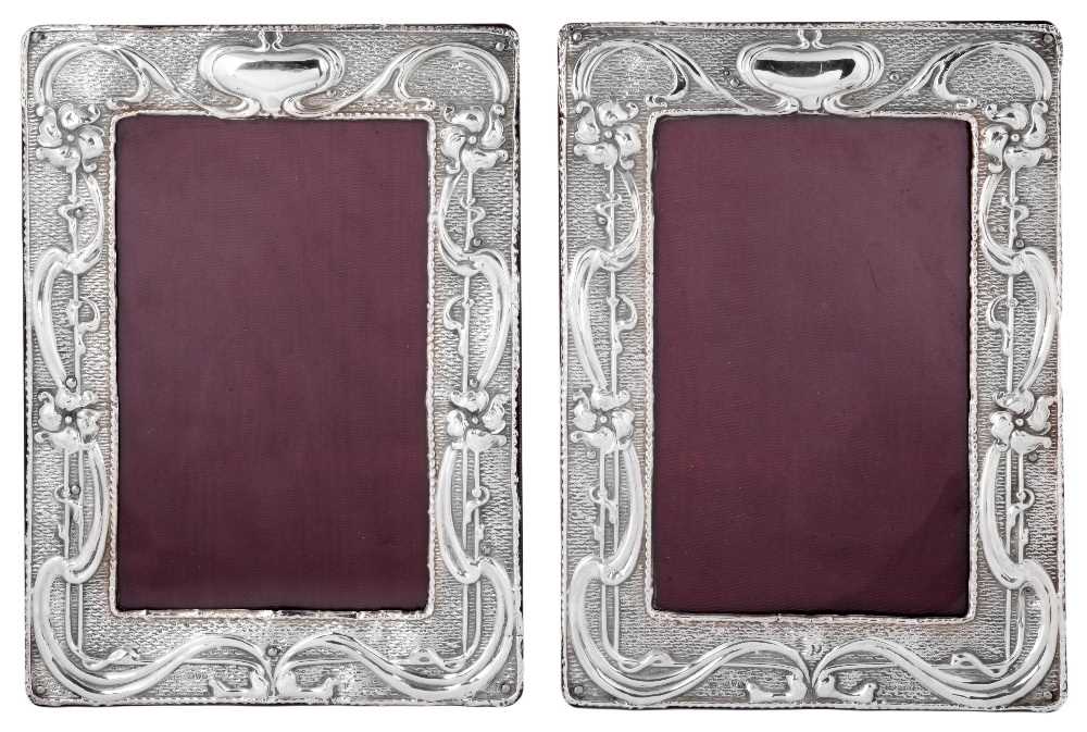 Lot 588 - A PAIR OF EDWARDIAN SILVER-MOUNTED