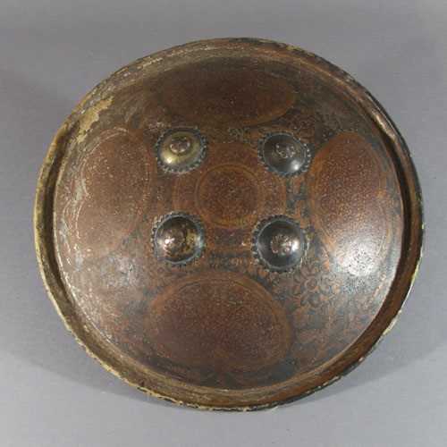 Lot 387 - A LEATHER SHIELD (dhal)