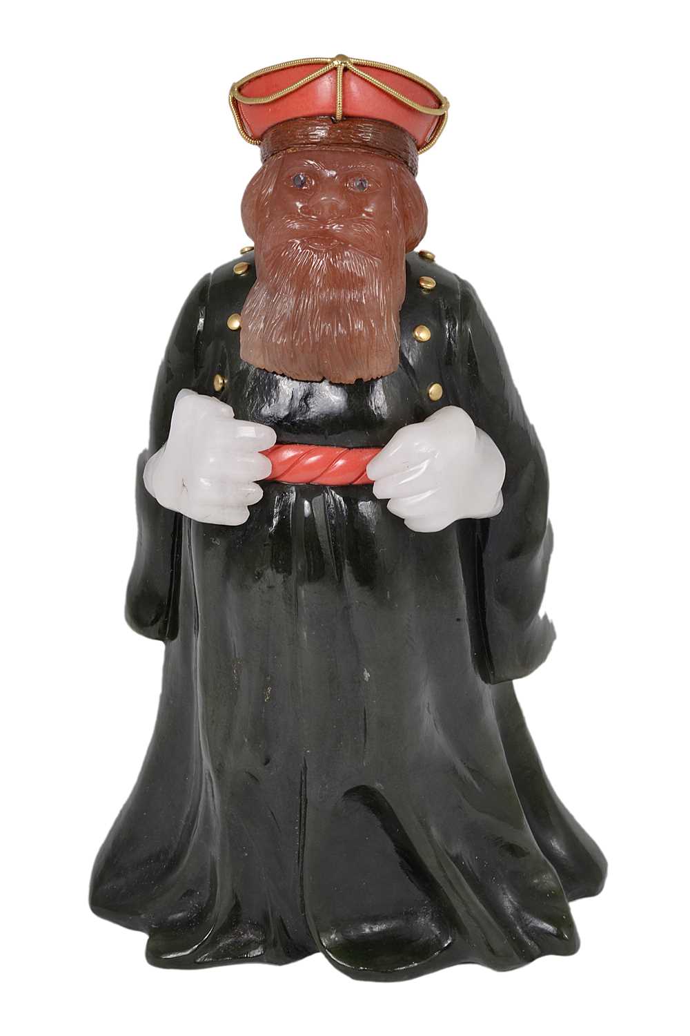 Lot 242 - A RUSSIAN STYLE CARVED HARDSTONE FIGURE OF
