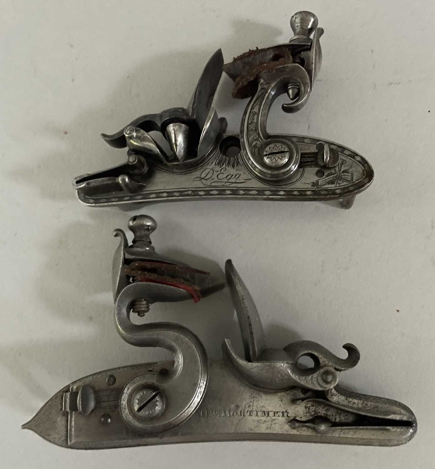 Lot 390 - TWO DETACHED FLINTLOCKS, THE FIRST BY H. W.