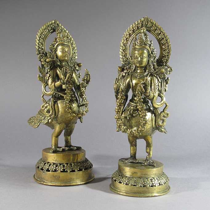 Lot 28 - A PAIR OF BIRD DEITIES