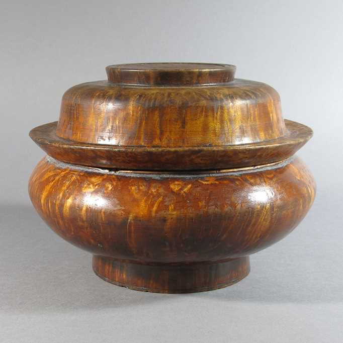 Lot 40 - A TURNED WOOD TSAMPA BOWL