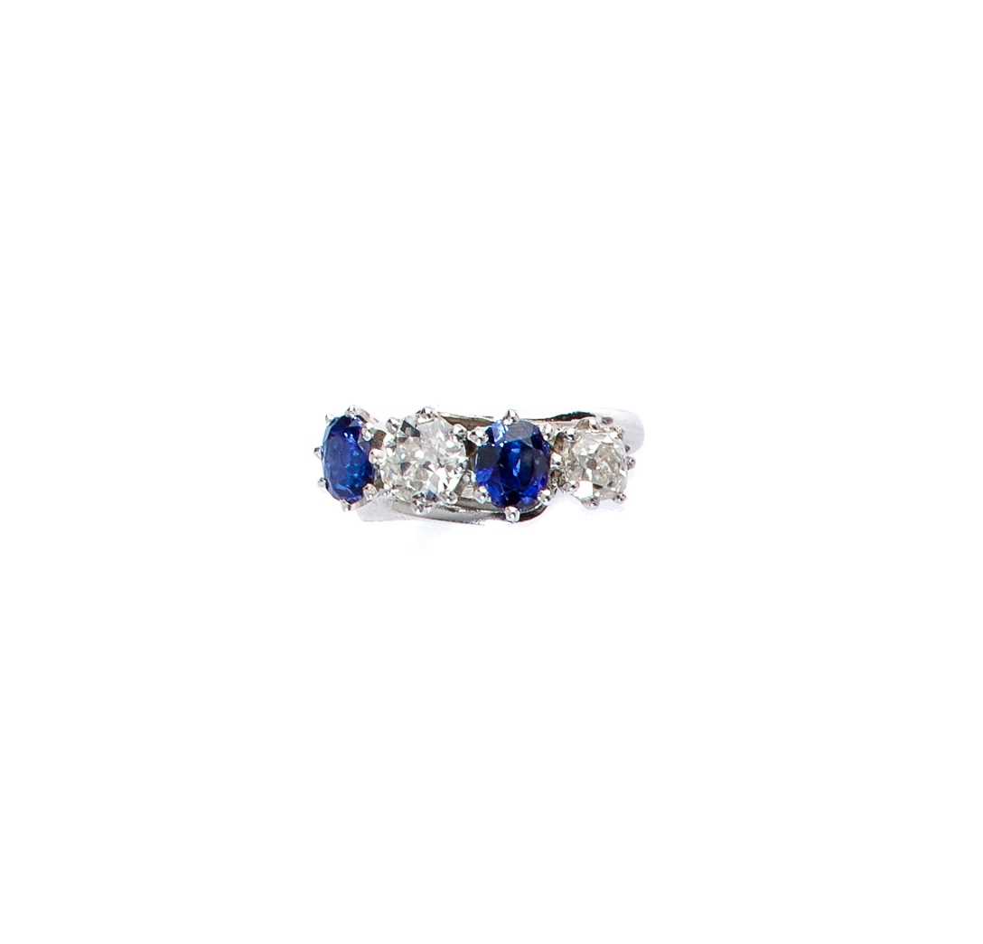 Lot 443 - SAPPHIRE AND DIAMOND HALF HOOP RING