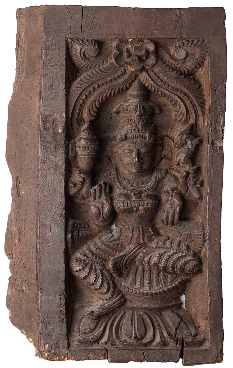 Lot 133 - A SMALL WOOD RELIEF PANEL