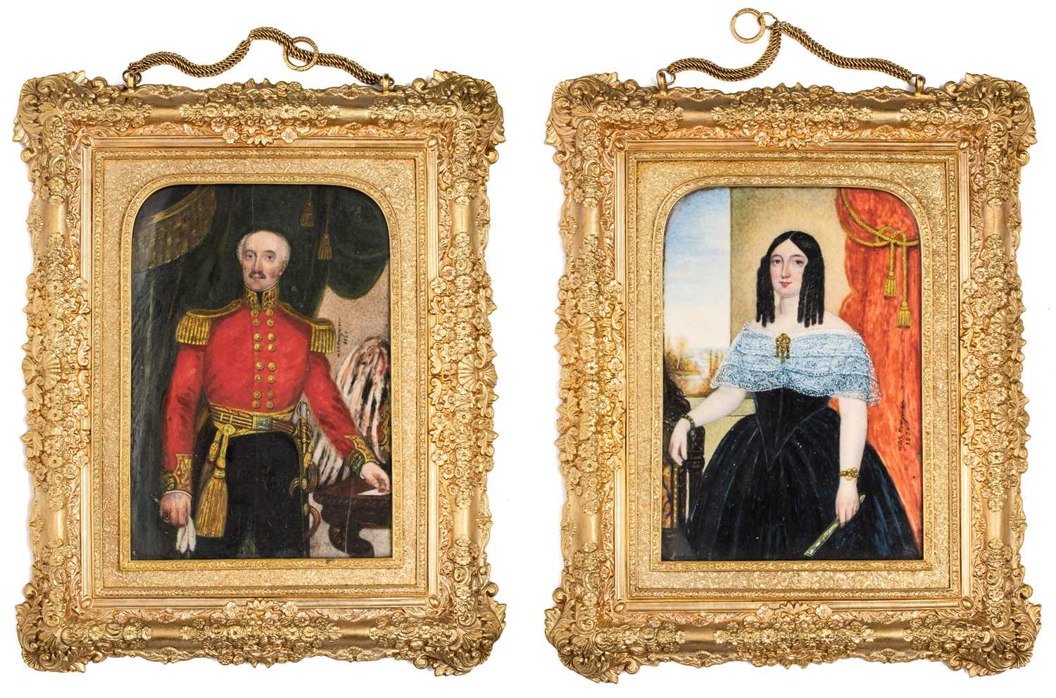 Lot 653 - ËœA PAIR OF PORTRAIT MINIATURES OF AN