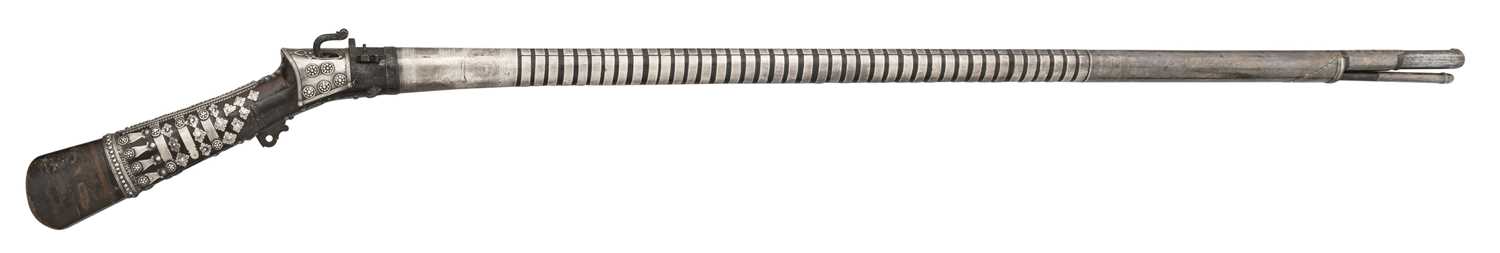 Lot 86 - A 20 BORE SOUTH INDIAN SILVER-MOUNTED