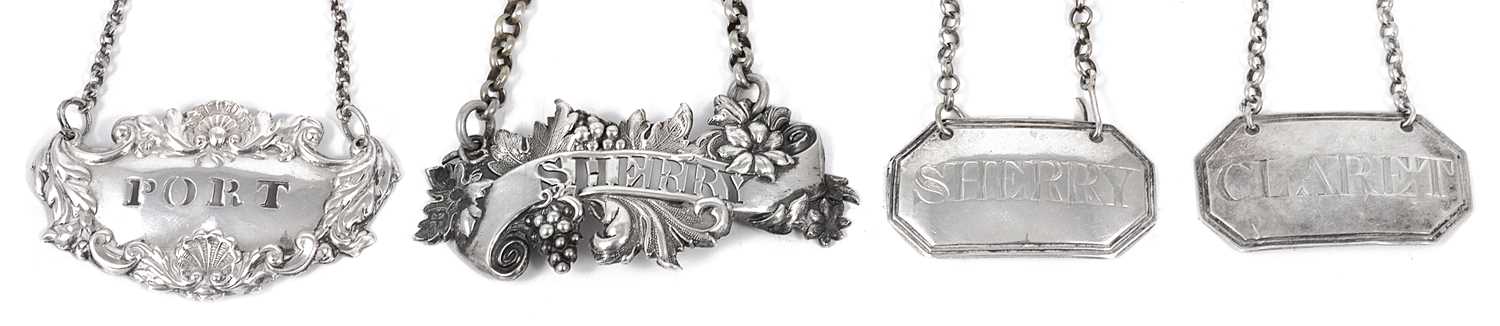 Lot 461 - A PAIR OF GEORGE III SILVER WINE LABELS