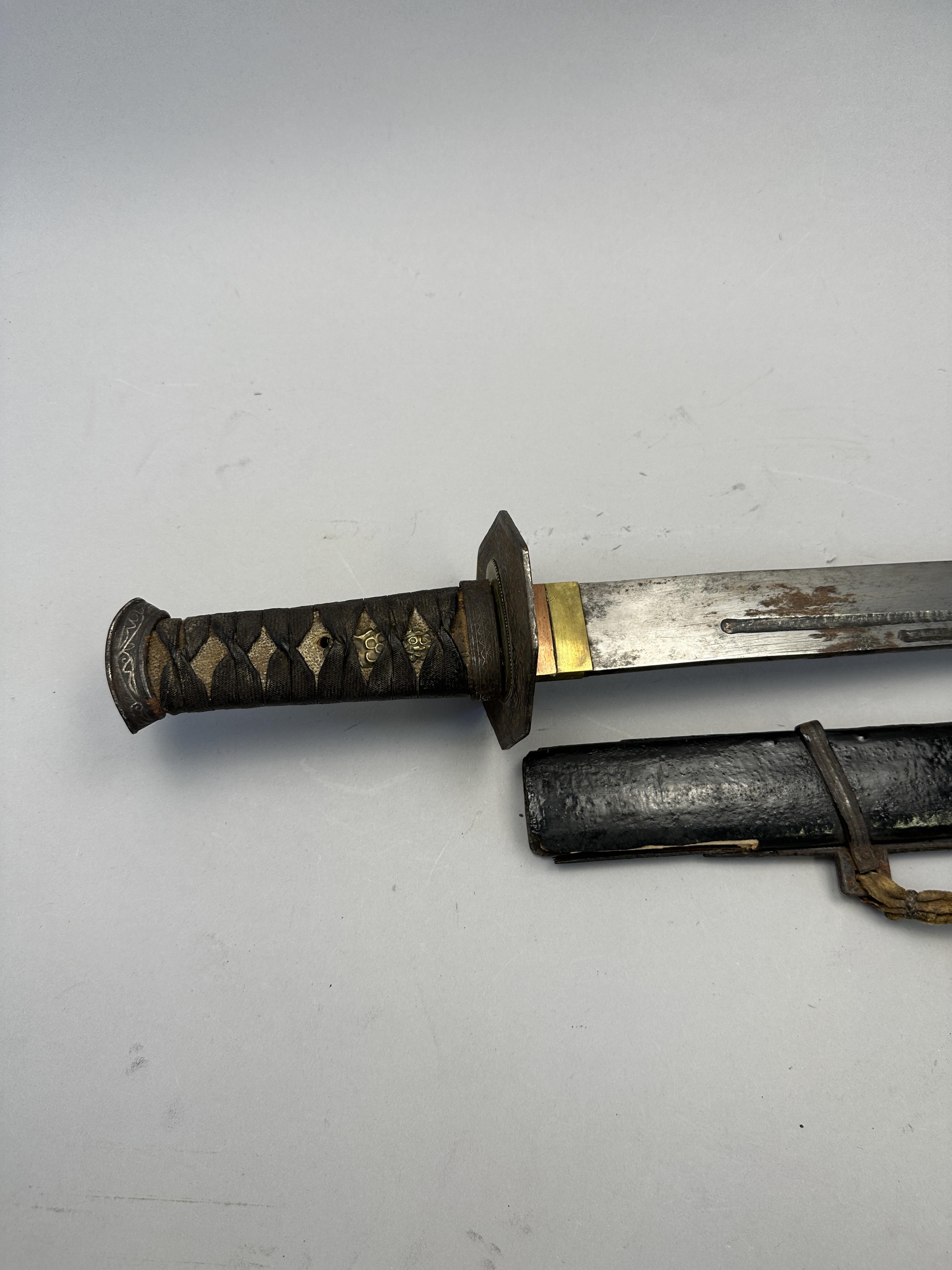 Lot 84 - A RARE KOREAN MILITARY SWORD ( HWANDO),