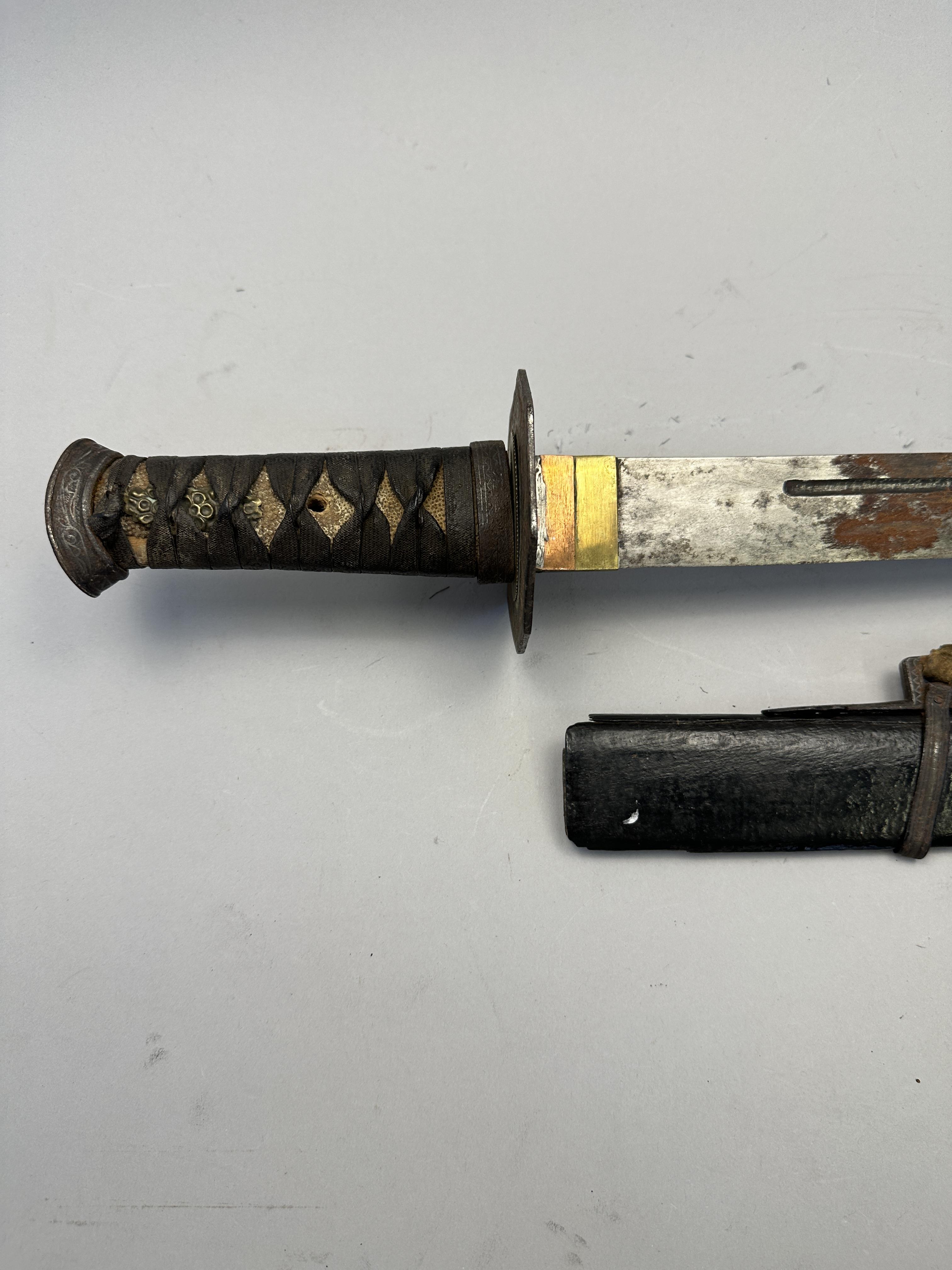 Lot 84 - A RARE KOREAN MILITARY SWORD ( HWANDO),