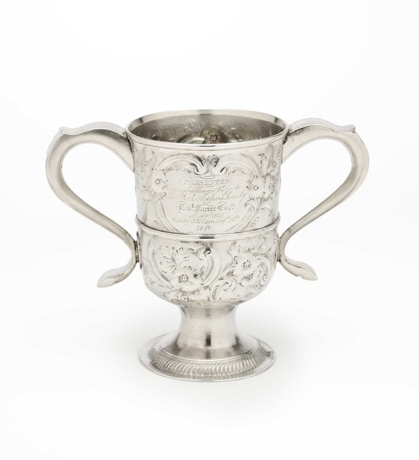 Lot 52 - A GEORGE III AND LATER CHASED SILVER CUP,