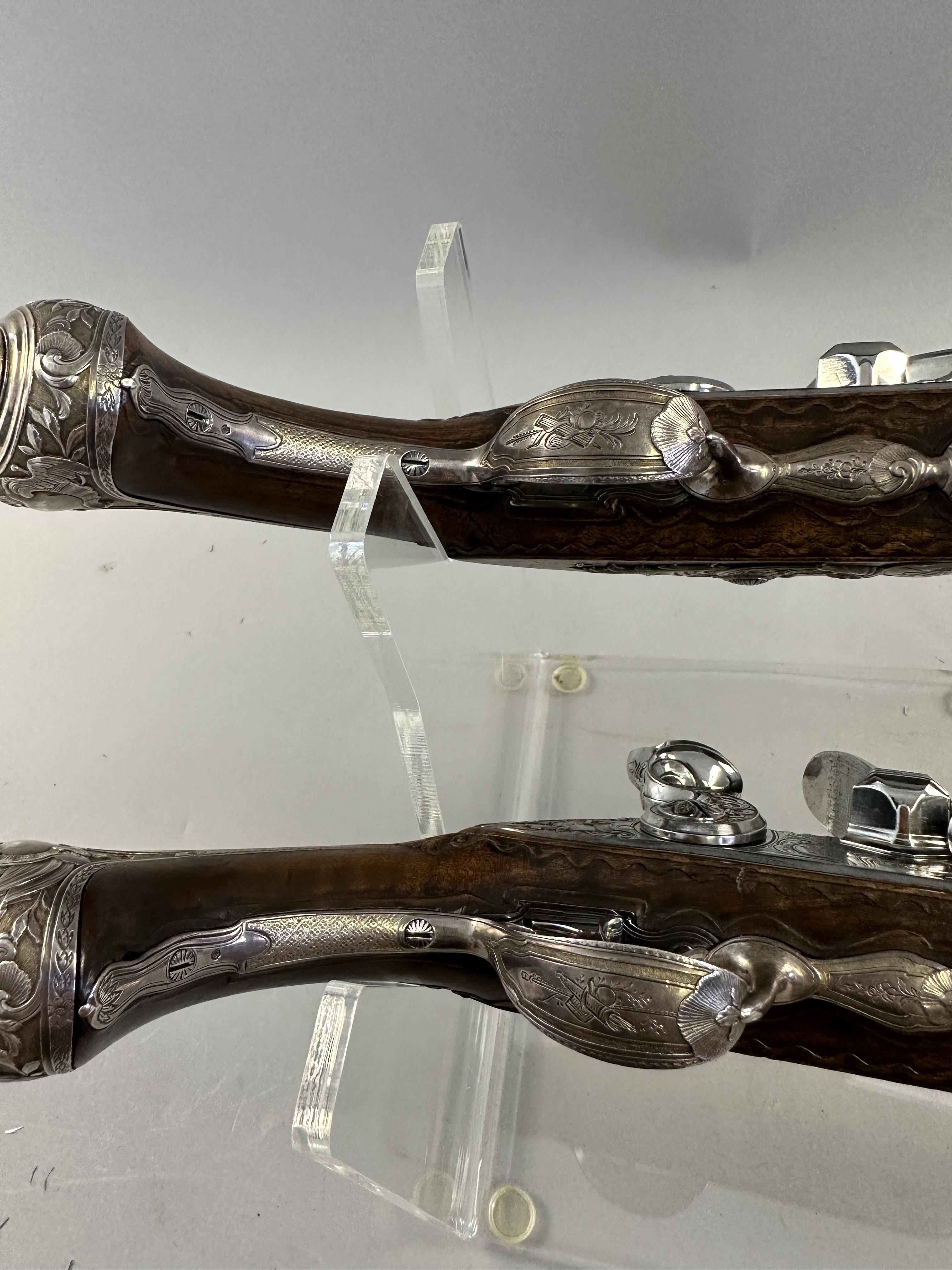 Lot 276 - A FINE PAIR OF 25 BORE FRENCH SILVER-MOUNTED