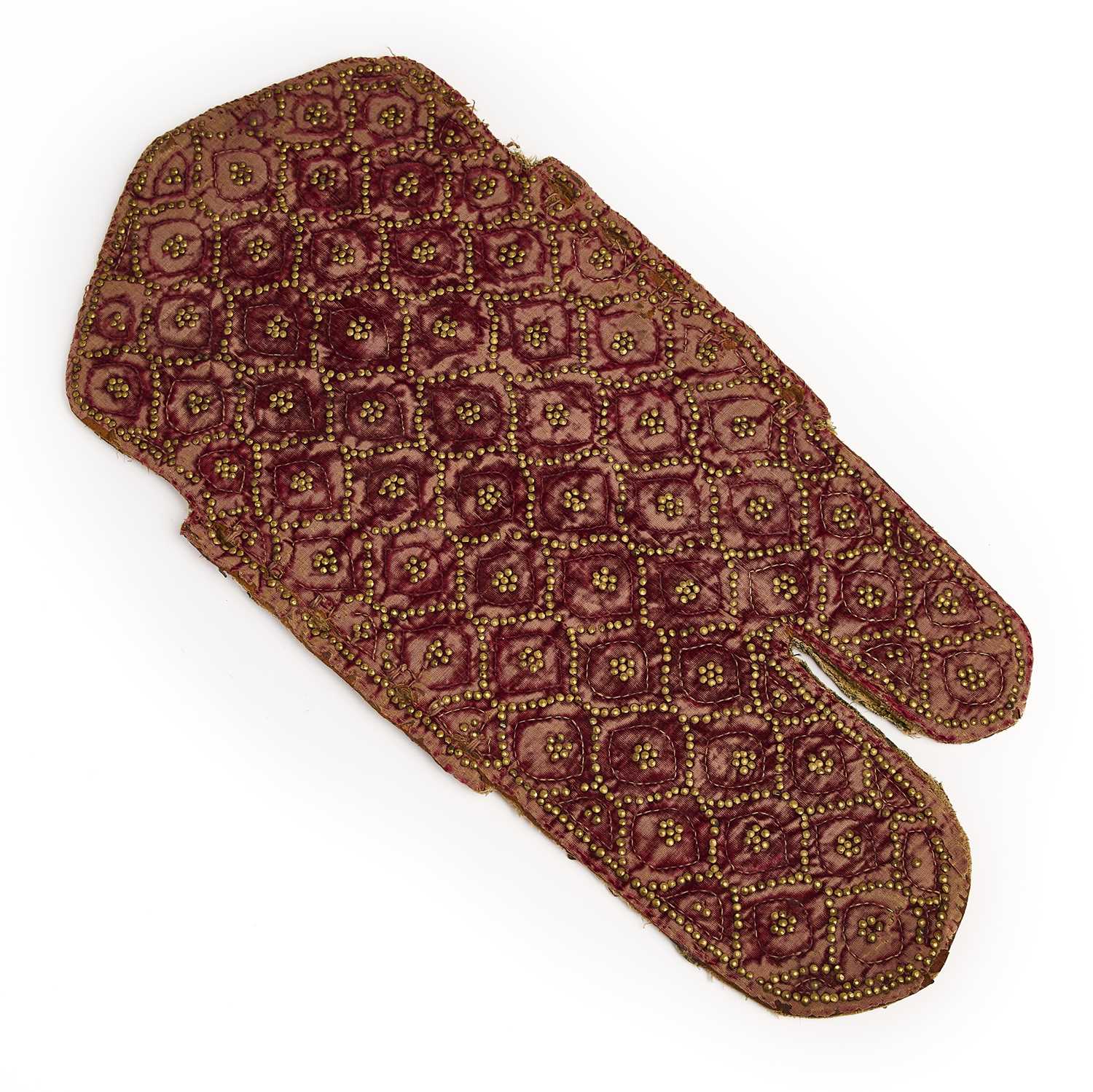 Lot 8 - A PADDED VELVET ARM GUARD, RAJASTHAN OR DECCAN,