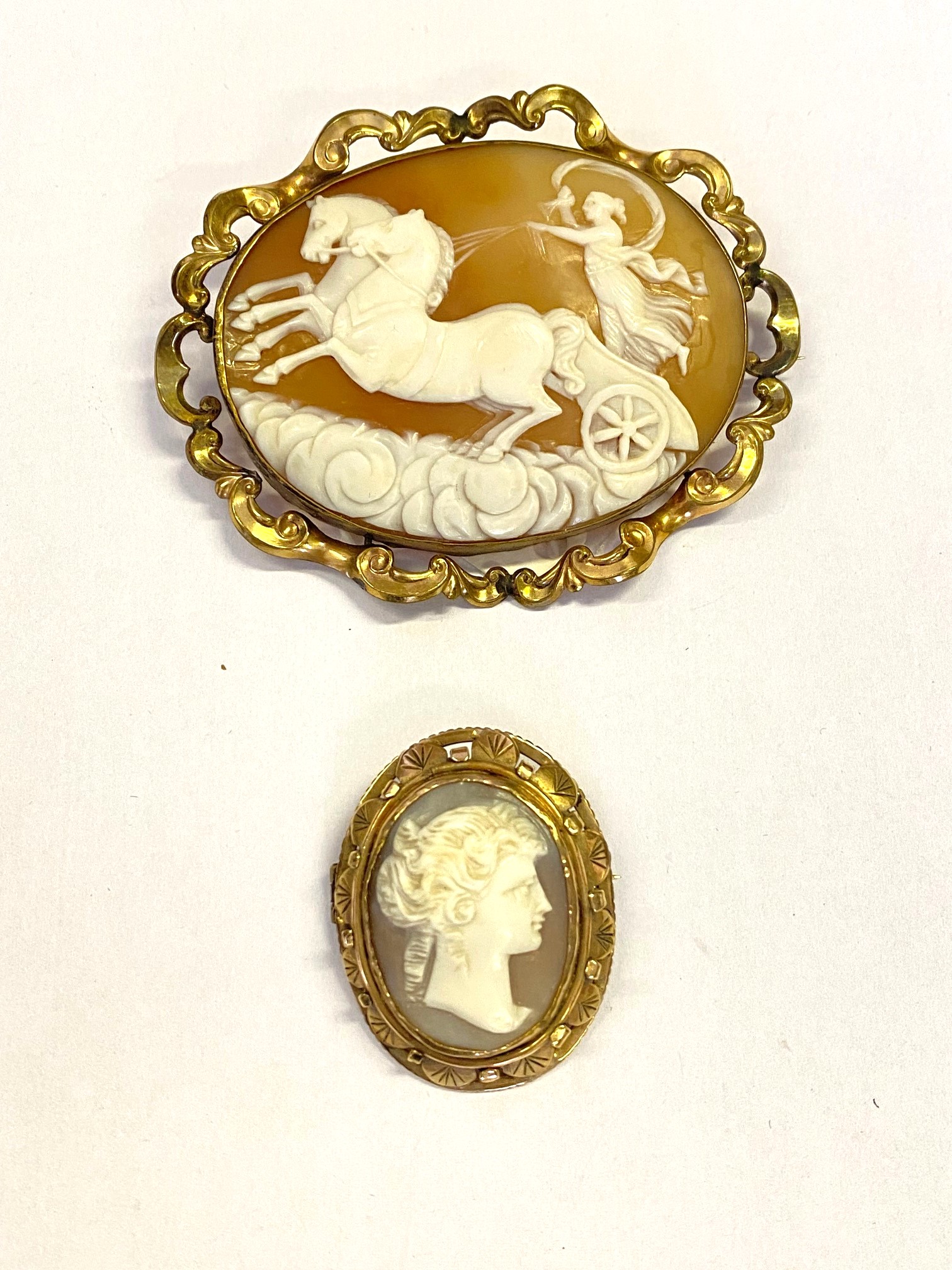 Lot 349 - FOUR CARVED SHELL CAMEO BROOCHES, 1870s